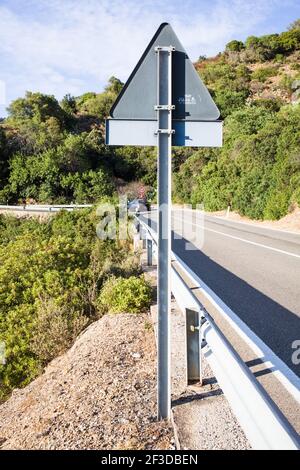 Back side of road sign, blue sky in background Stock Photo - Alamy