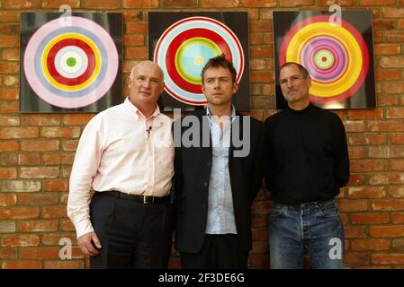 Eric Nicoli (EMI) lt. , Damon Albarn and Steve Jobs (Apple) at a ...