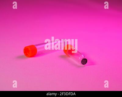 2D barcoded tubes for biological sample storage. Jacketed on left, non ...