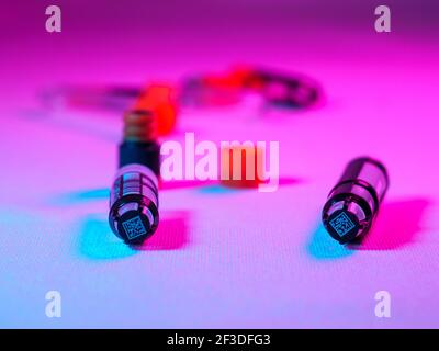 An assortment of jacketed 2D barcoded biological sample tubes Stock ...