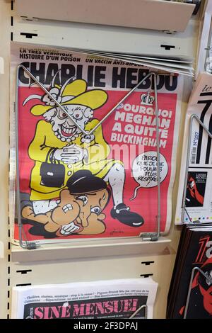 The front page of Charlie Hebdo with Meghan Markle and the Queen ...