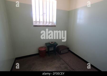 Prison cell of Nelson Mandela in the former prison on Robben Island ...