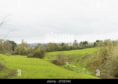 Rooftops, countryside, trees, field, high buildings in Leicester city ...