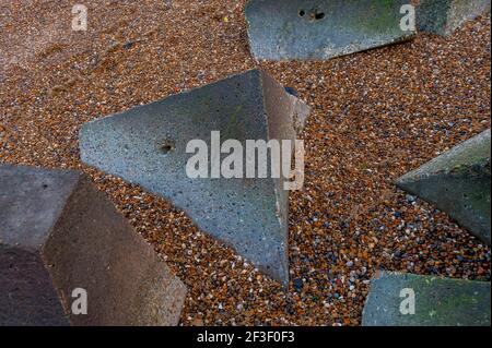 Sea defence blocks placed to stop erosion on the beach at Grain Kent ...