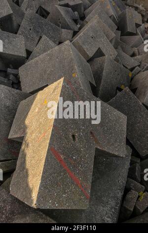Sea defence blocks placed to stop erosion on the beach at Grain Kent ...