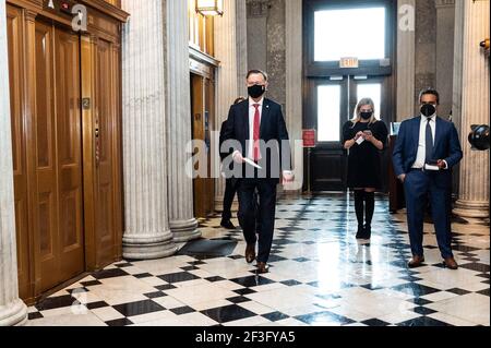 U.S. Senator John Hickenlooper (D-CO) speaking at a hearing of the ...