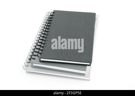 Stack of notebooks (or copybooks) on white background Stock Photo - Alamy