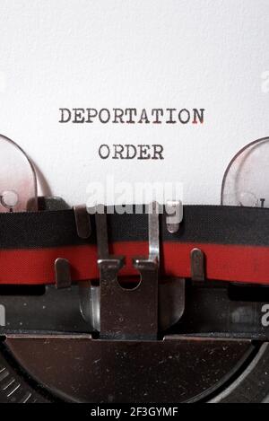 Deportation order phrase written with a typewriter Stock Photo - Alamy