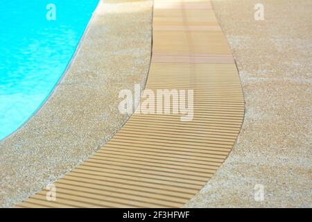 Swimming pool edge with drain Stock Photo - Alamy