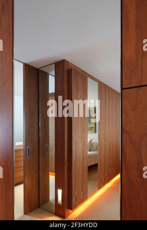 Bedroom with walnut joinery. Lights on | Architect: MAP Projects ...