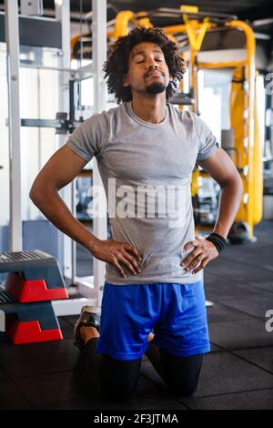 Fitness man tired relaxed after workout exercise Stock Photo - Alamy