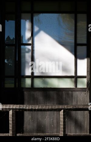 Traditional Japanese architectural window detail with bamboo bars and ...