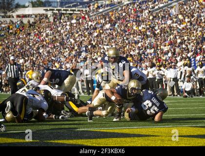 US Navy U.S. Naval Academy quarterback (^2) Kriss Proctor runs the ball ...
