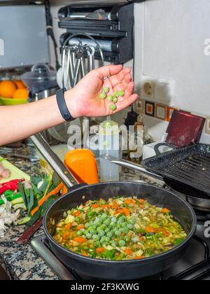 The vegetables frying in a small amount of fat Stock Photo - Alamy