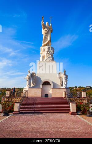 Statue, of the risen Jesus Christ in glory, on an outside wall at the ...