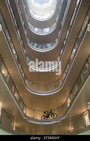 Low angle view of Atrium with bicycle, Manchester, England, UK Stock ...