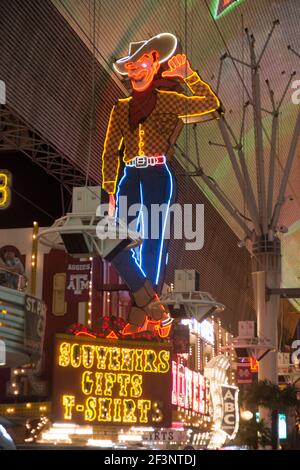 Neon Cowboy Vic, Downtown Las Vegas Stock Photo - Alamy
