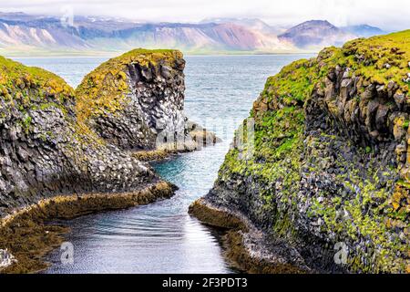 The stone bridge. Arnarstapi. Snaefellsnes peninsula. Iceland Stock ...