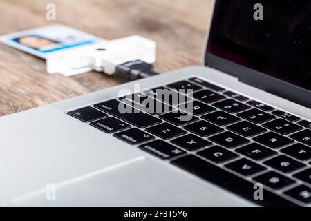 A personal identity verification (PIV) card is used to login to a ...