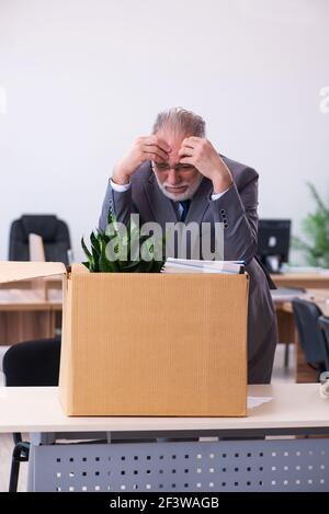 Old employee being fired from his work Stock Photo - Alamy