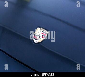 DeLorean logo sign close up of the classic sports car exterior. Emblem ...