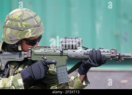 A soldier, with Automatic Carbine 5C (Ak 5C), in the Swedish Armed ...