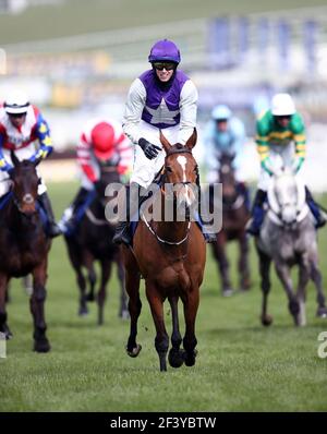 Mrs Milner ridden by Bryan Cooper (no.16) wins the Pertemps Network ...