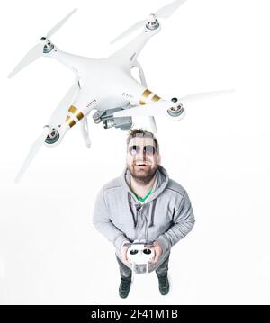 man playing with a multicopter Stock Photo - Alamy