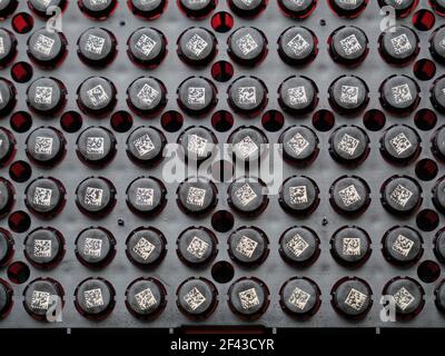 Racked 2D barcoded sample tubes, view of bottom of rack Stock Photo - Alamy