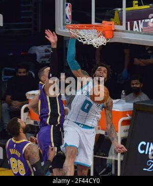 Charlotte Hornets forward Miles Bridges (0) dunks in front of ...