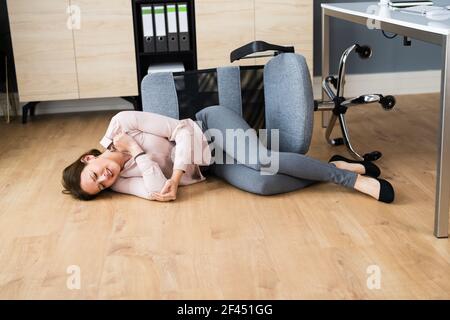 Slip Fall Office Chair Accident At Workplace Stock Photo - Alamy