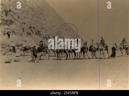Giza, Egypt. Hapag tourist group on camels and donkeys with tourists at ...