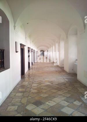 Medieval Corridor With Windows on the Left at Wooden Furniture on the ...