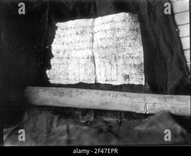 Brahmi font fragments on parchment (top) and palm sheet (below Stock ...