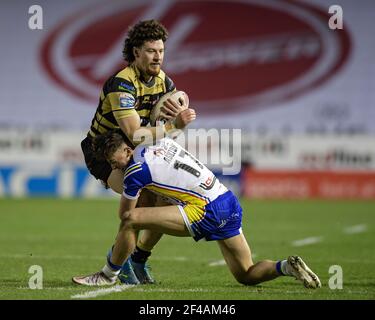 Warrington Wolves Matty Ashton is tackled by a defender during the ...