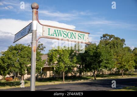 Mudgee town centre and road sign giving directions to Gulgong and ...