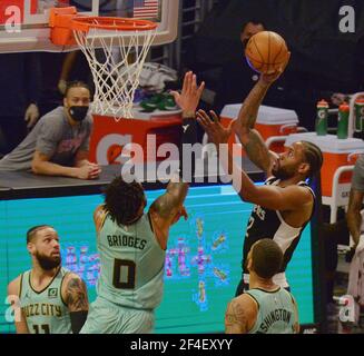 Charlotte Hornets forward Miles Bridges (0) dunks in front of ...