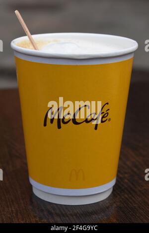 A paper cup of McDonald's McCafe hot coffee on white background cutout ...