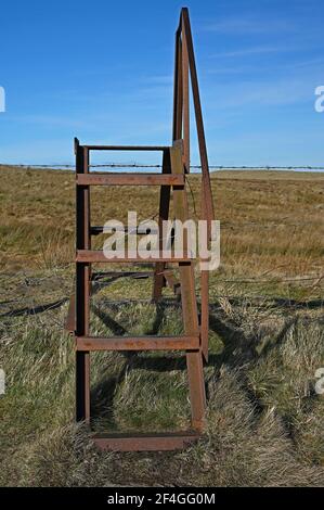 a stile over a barbed wire fence Stock Photo - Alamy