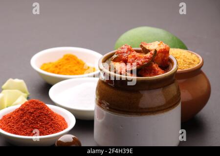 Traditional spicy green mango achar Stock Photo - Alamy