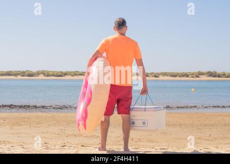 Swimming trunks floating on water surface Stock Photo - Alamy
