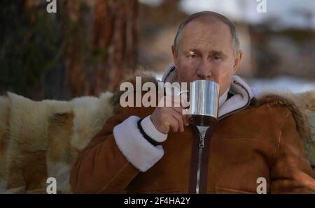 Tuva, Russia. 21st Mar, 2021. Russian President Vladimir Putin poses in ...