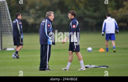 SHAUN DERRY of QPR. MANAGER NEIL WARNOCK AIN HIS OFFICE AT THE TRAINING ...