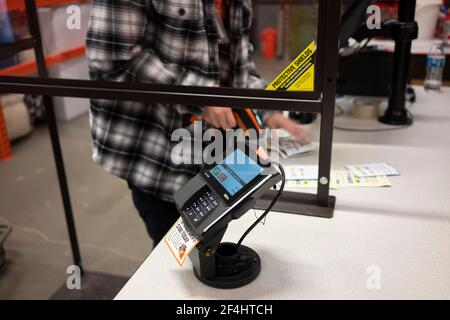 Barcode scanner with cashier screen in the background Stock Photo - Alamy