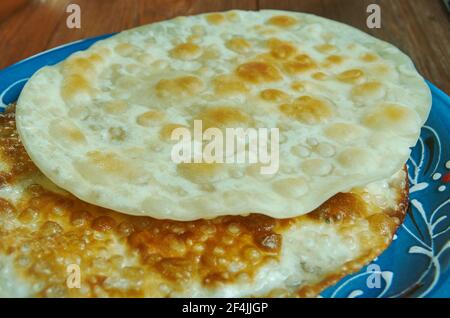 Kitcha fir-fir - Ethiopian flatbread made with wheat flour Stock Photo ...
