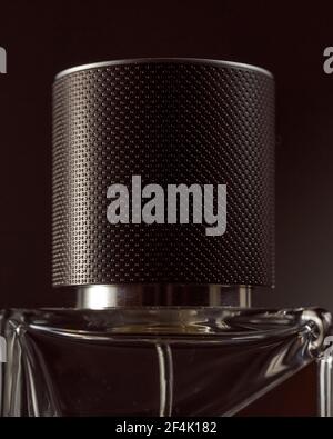 Silver cufflinks with rhinestones on a black background next to the ...