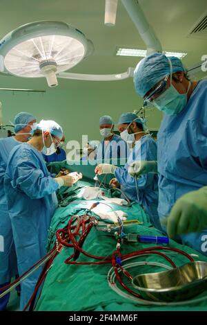 Consultant cardiologist Ciro Campanella (wearing optics), and his team ...