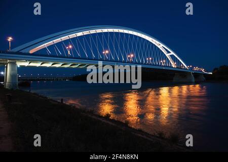 Apollo bridge on Danube river by night Stock Photo - Alamy