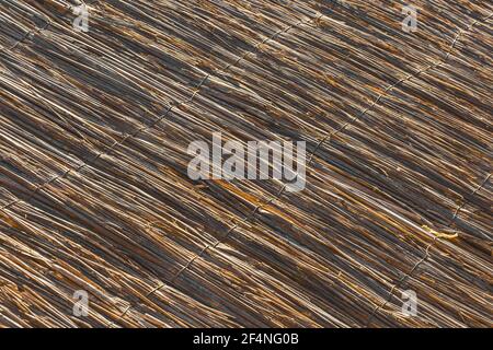 Braided bamboo or sea reed surface handmade texture brown background ...