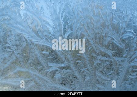 patterns formed on frozen window pane Stock Photo - Alamy